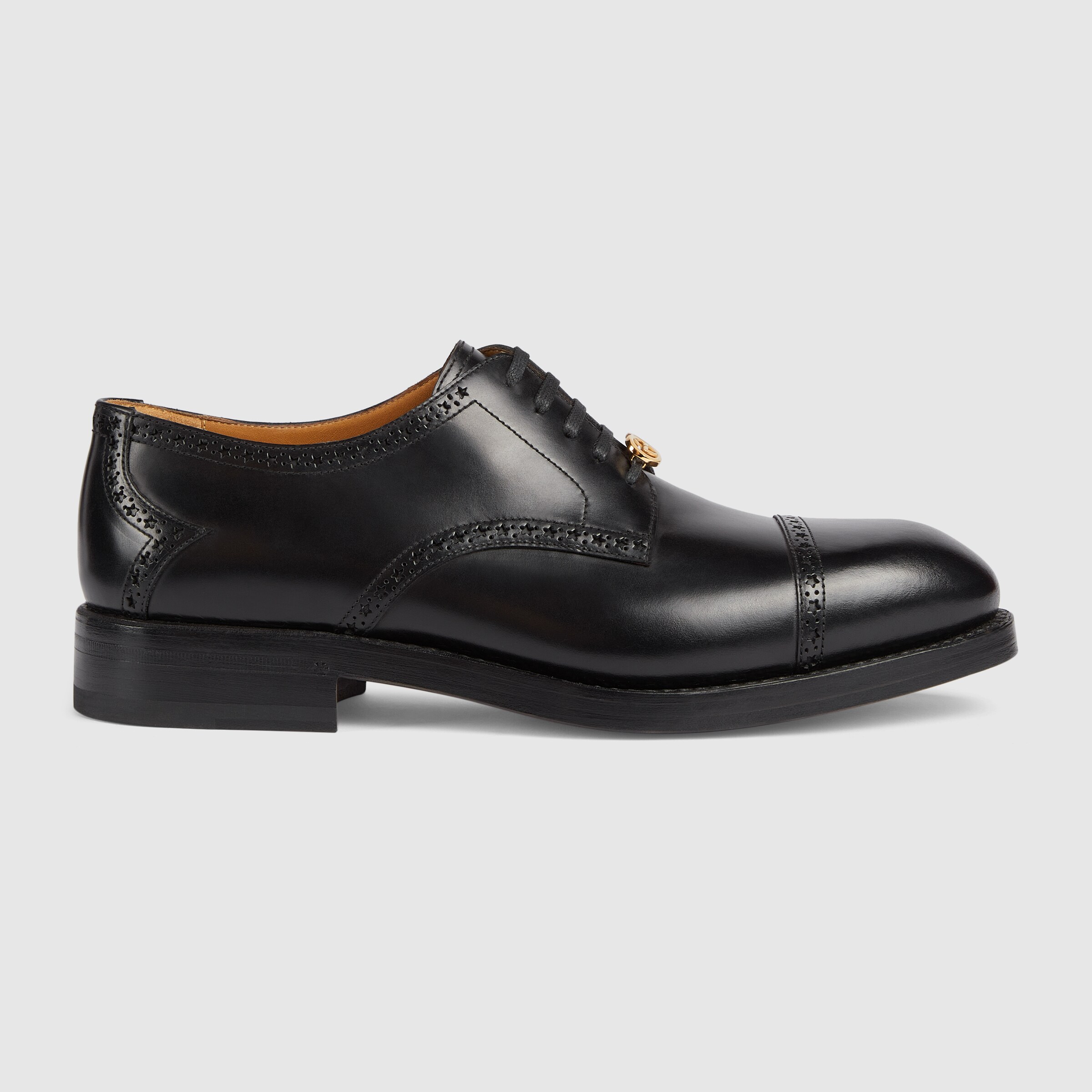 Men's lace-up shoe with brogue details in black leather | GUCCI® GR