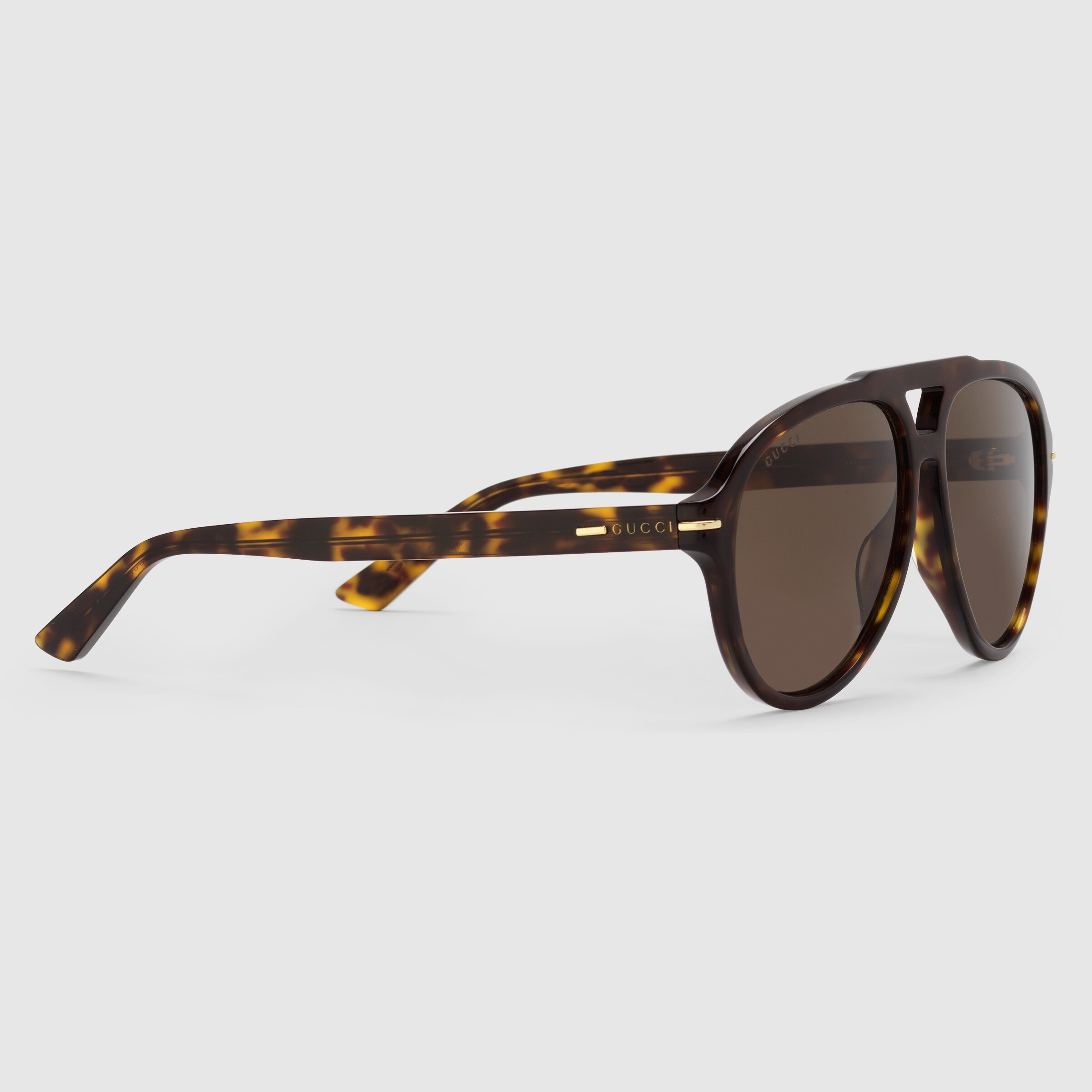 Navigator frame sunglasses in tortoiseshell acetate | GUCCI® TH
