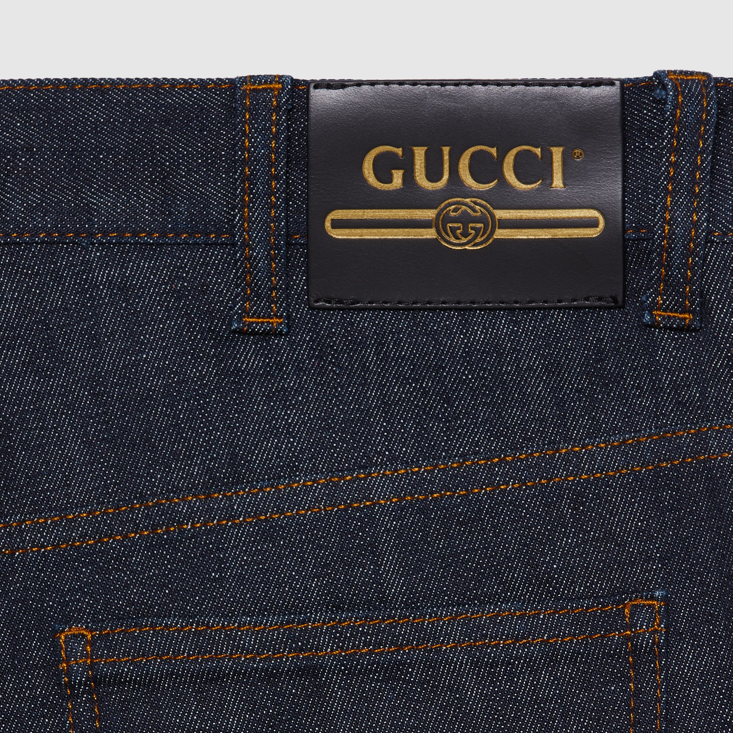 Regular fit washed jeans in dark blue denim | GUCCI® US