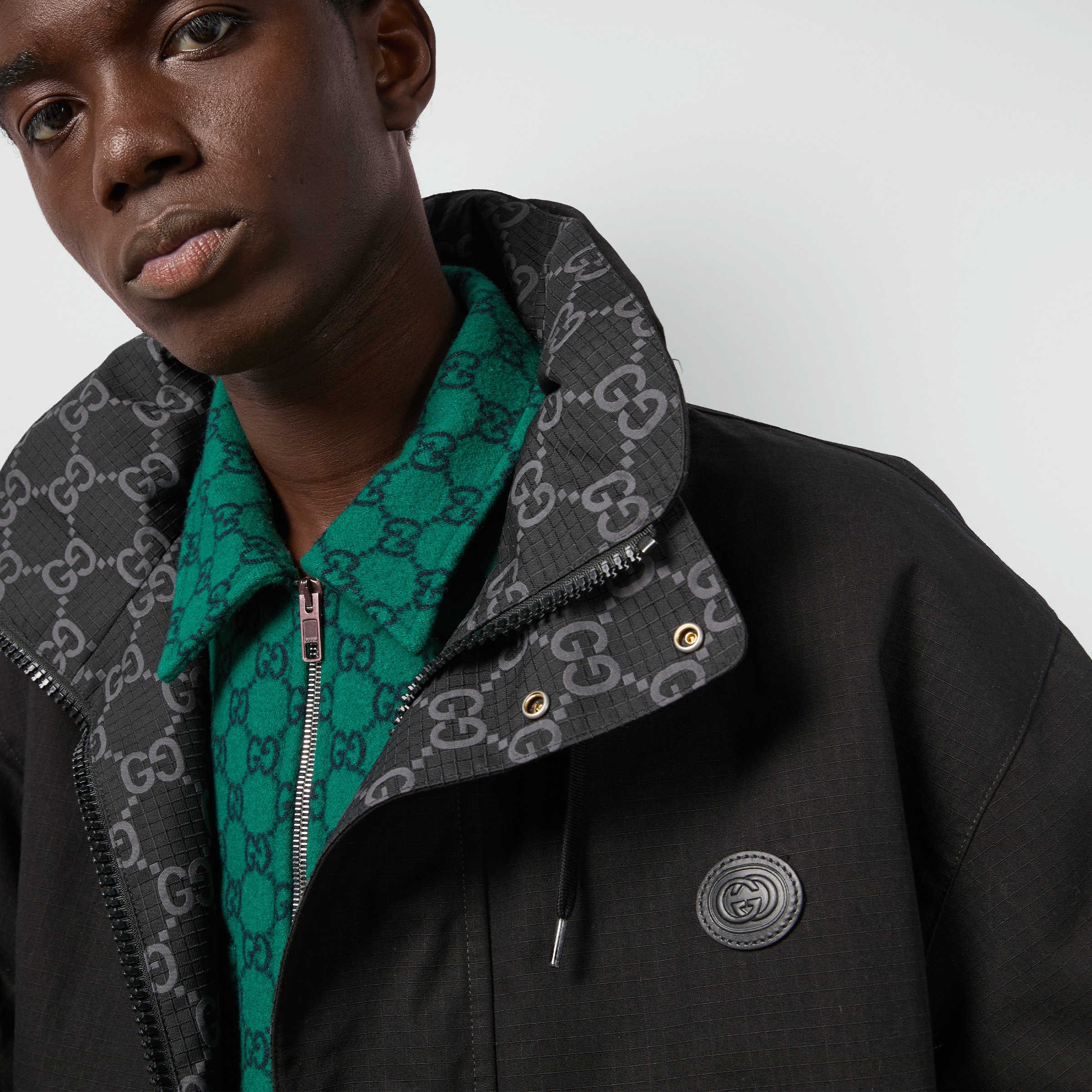 Veste réversible en nylon indéchirable GG en noir et gris | GUCCI® FR