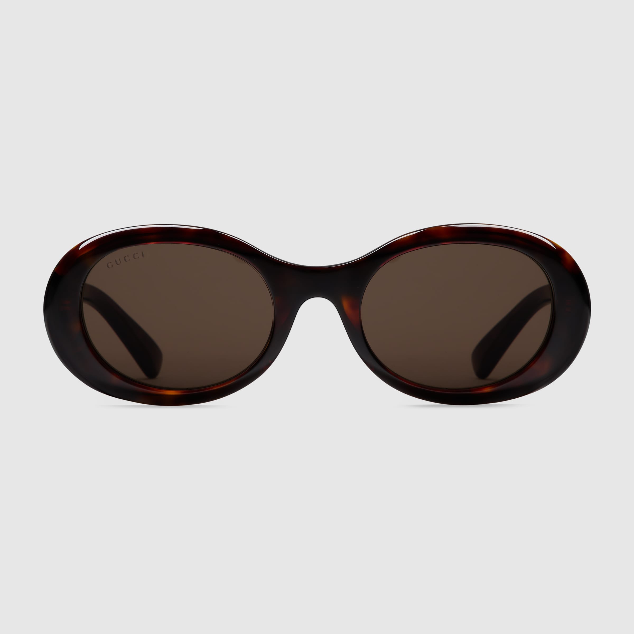 Oval-shaped sunglasses in tortoiseshell acetate | GUCCI® US