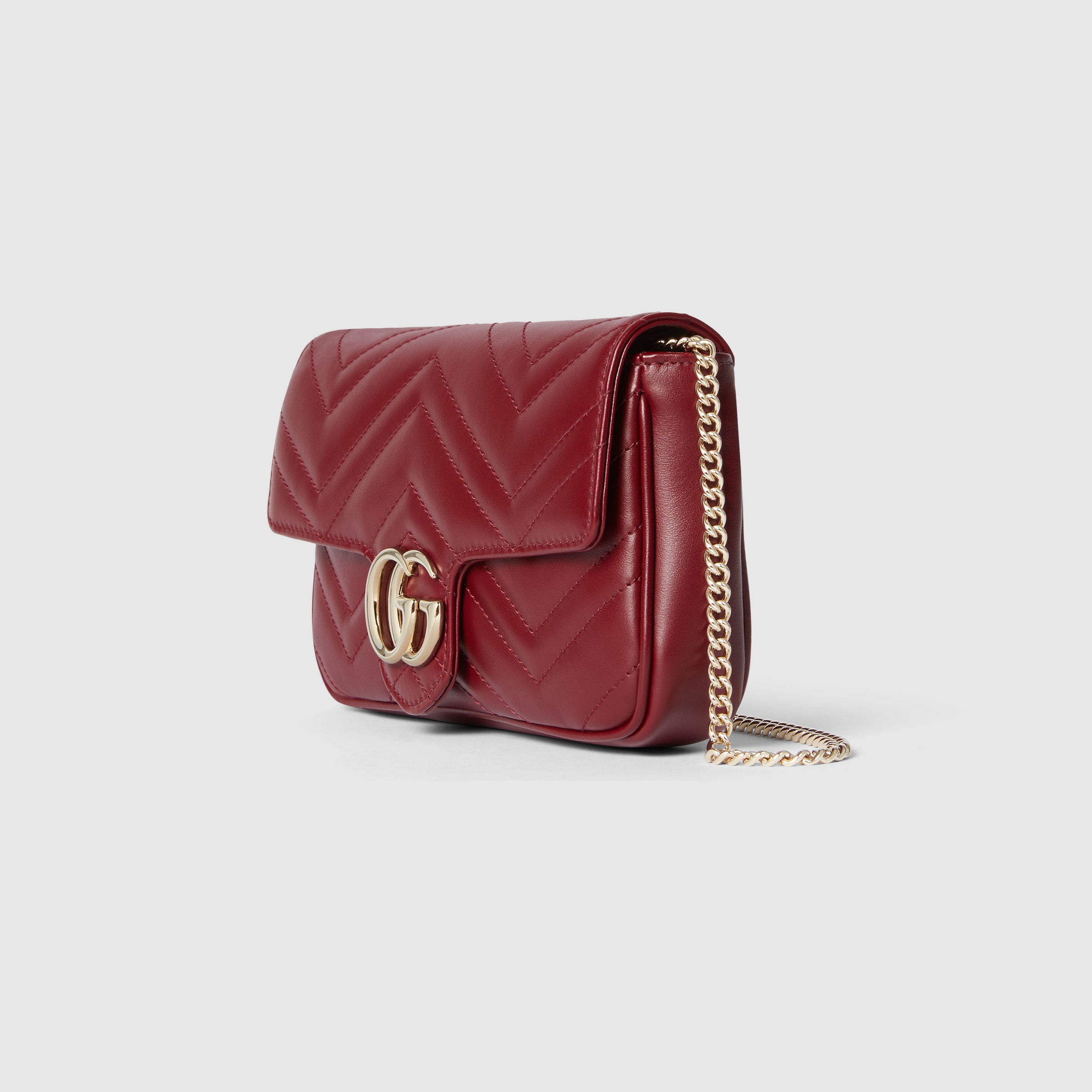 GG Marmont small shoulder bag in Rosso Ancora red leather | GUCCI® UK
