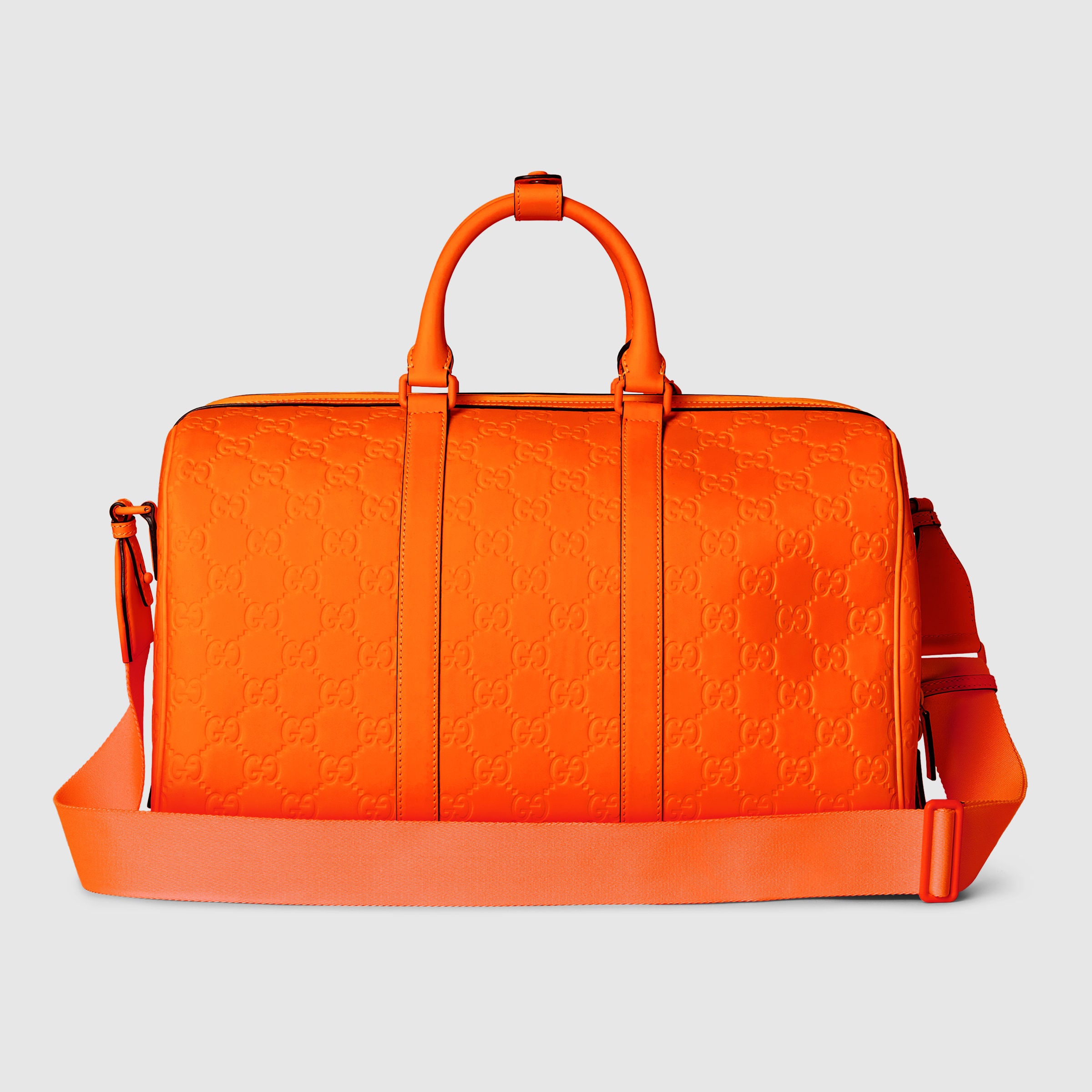 GG rubber-effect medium duffle bag in bright orange leather | GUCCI® US
