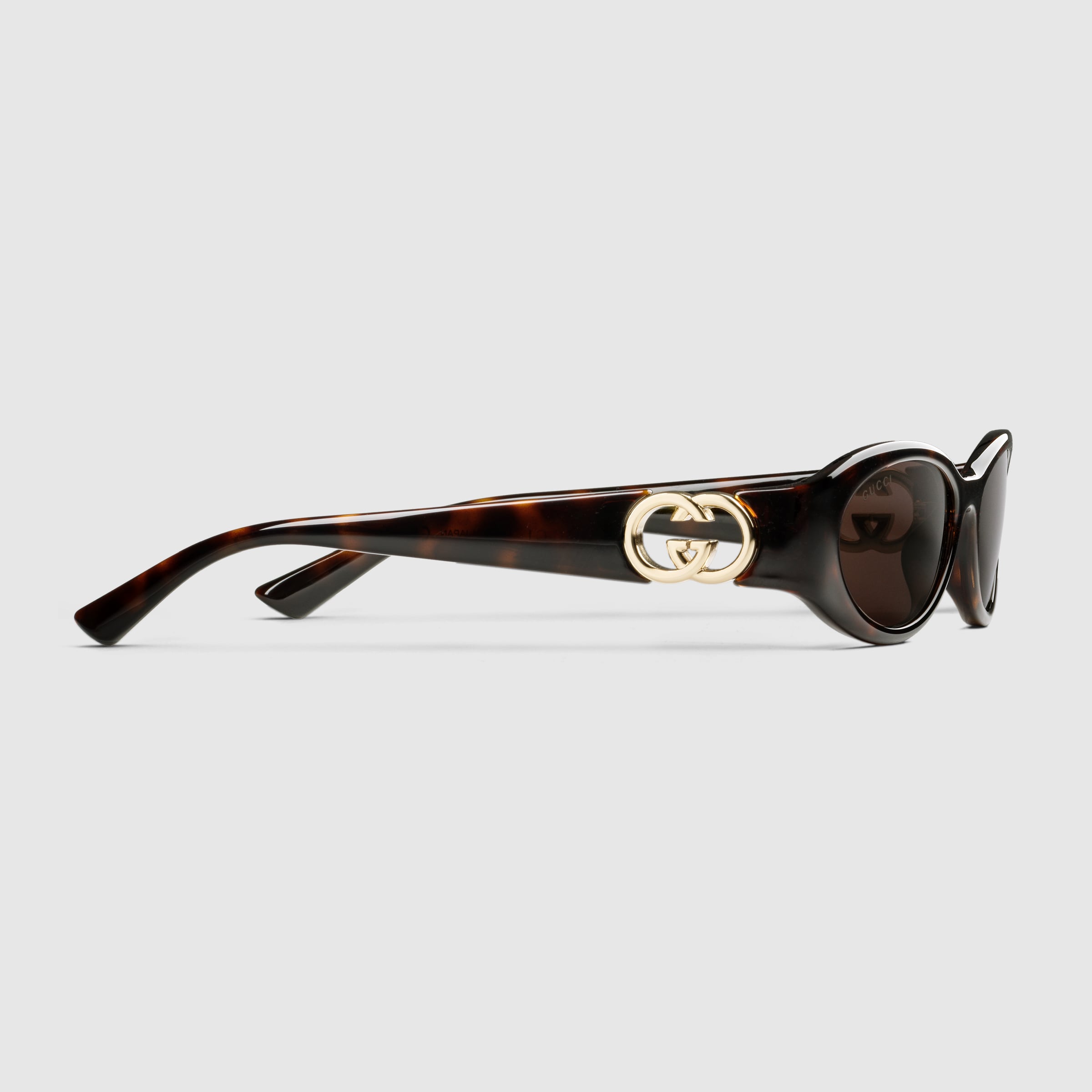 Oval frame sunglasses in tortoiseshell | GUCCI® ZA