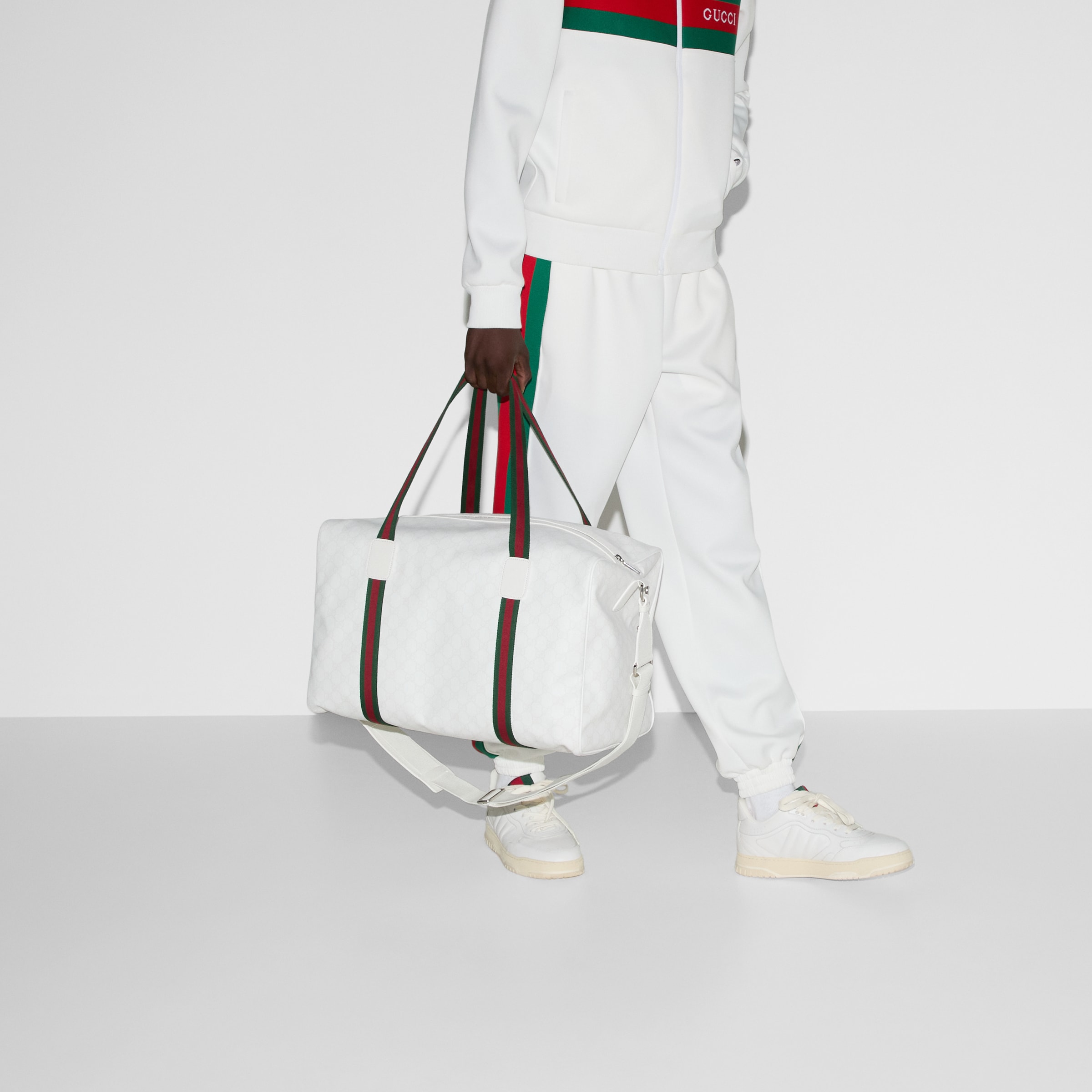Medium duffle bag with Web in white GG Supreme | GUCCI® US
