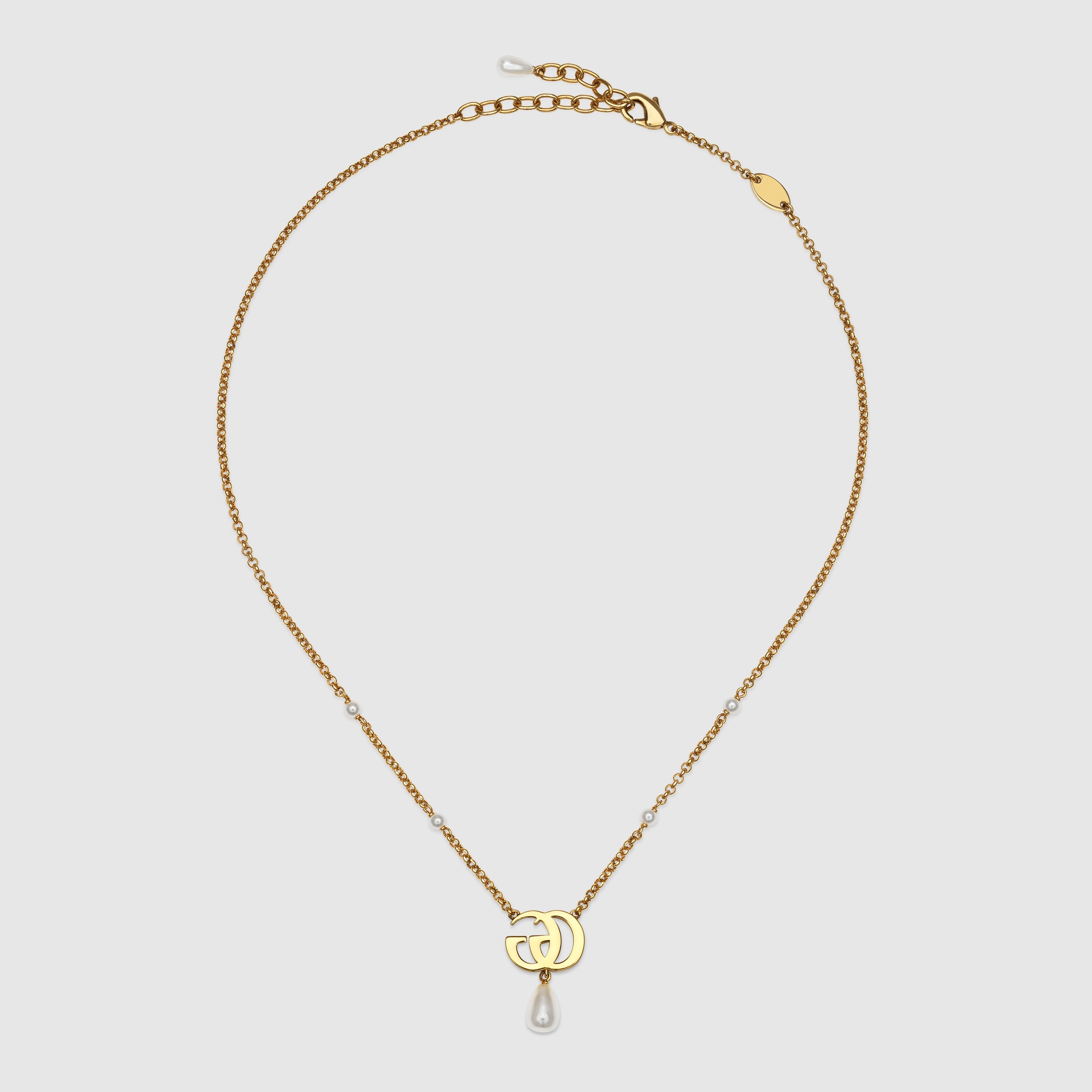GG Marmont pendant necklace in yellow gold-toned metal | GUCCI® US