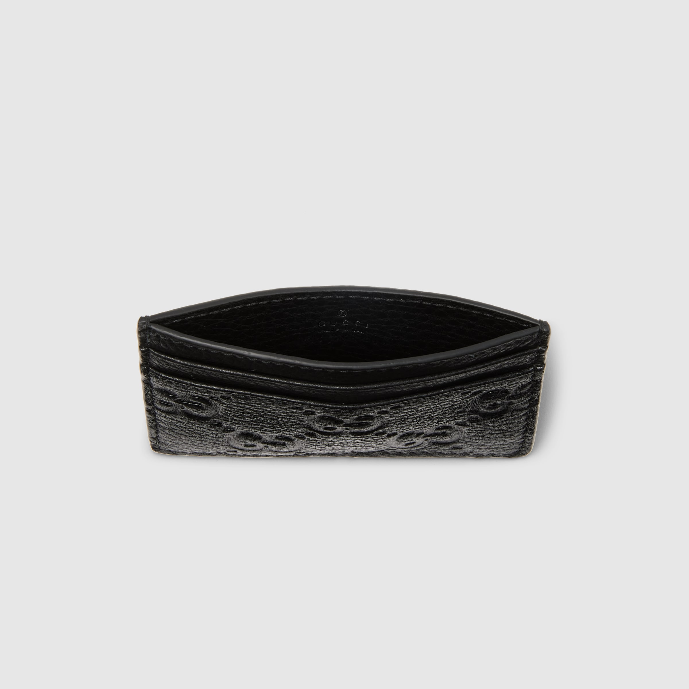 GG Emblem card case in black leather | GUCCI® US