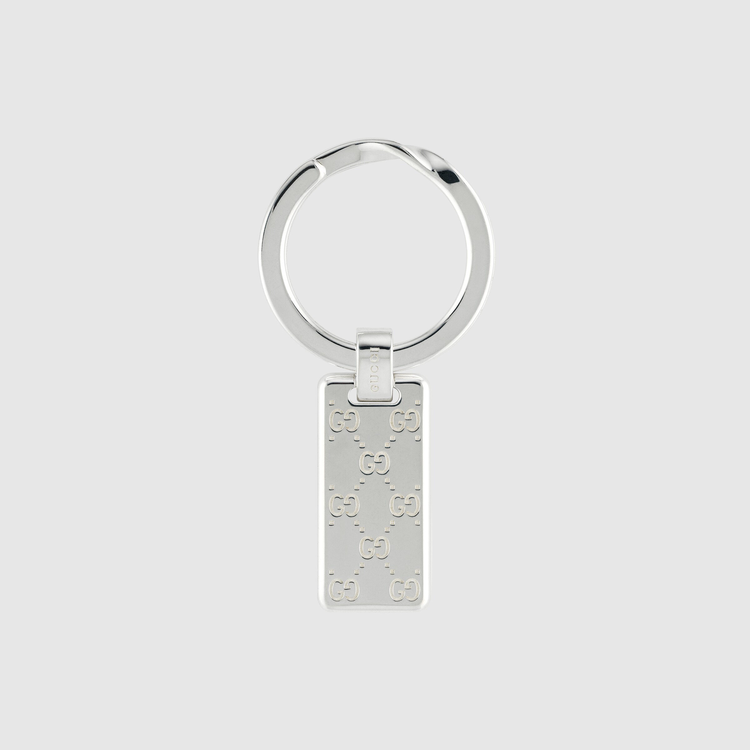 Gucci Signature GG engraved keyring in 941 sterling silver | GUCCI® US
