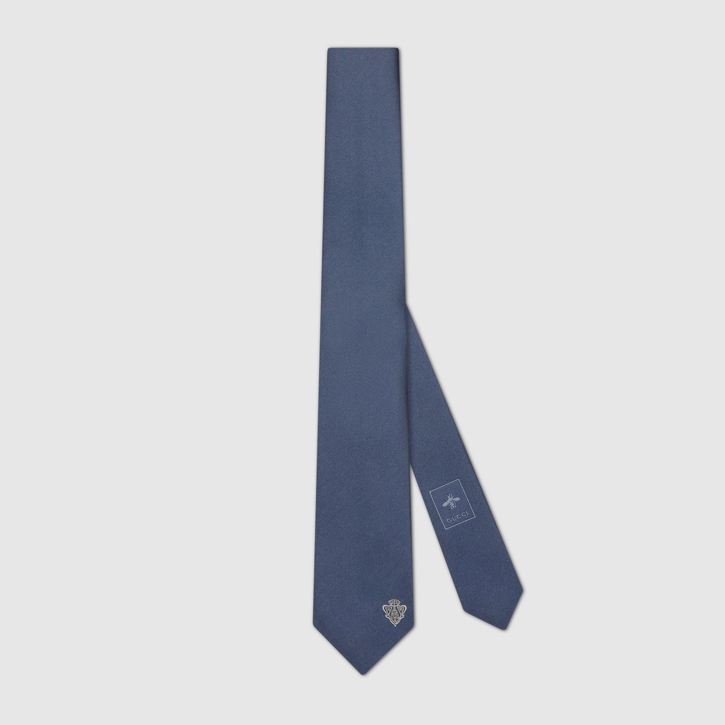 Silk jacquard tie with Gucci crest in blue | GUCCI® US