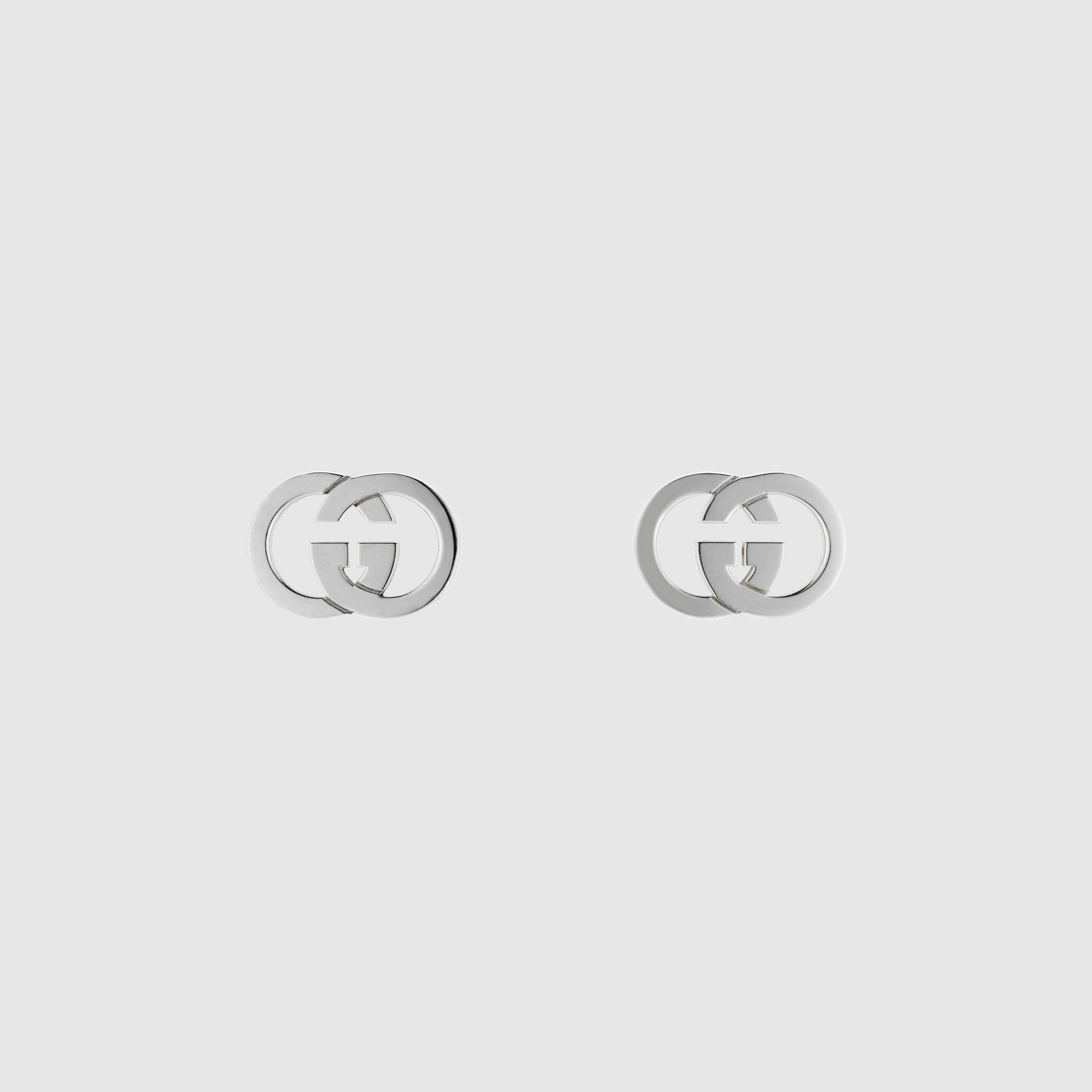 Gucci Interlocking stud earrings in 925 sterling silver | GUCCI® US