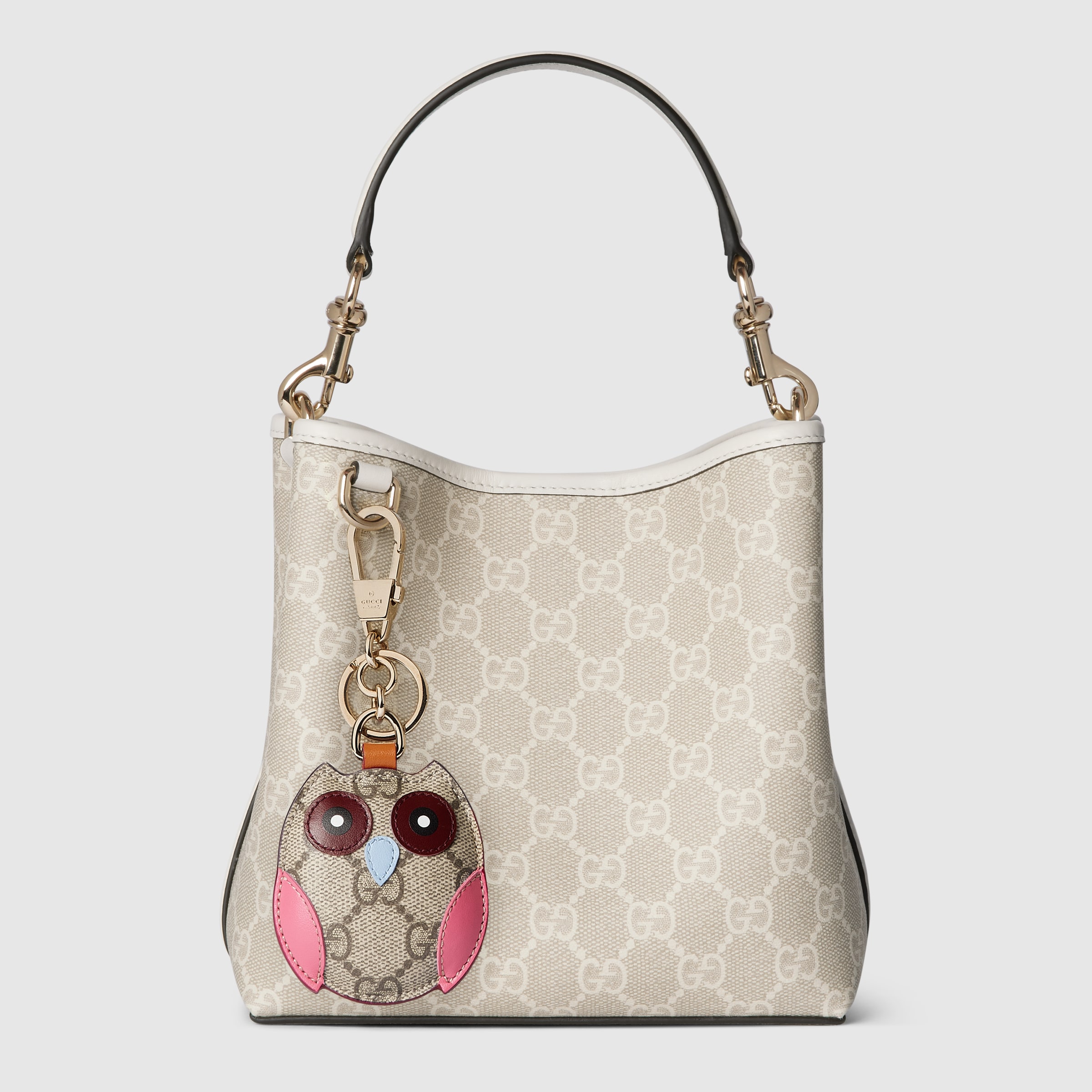GG Emblem small bucket bag in beige and white fabric | GUCCI® SG