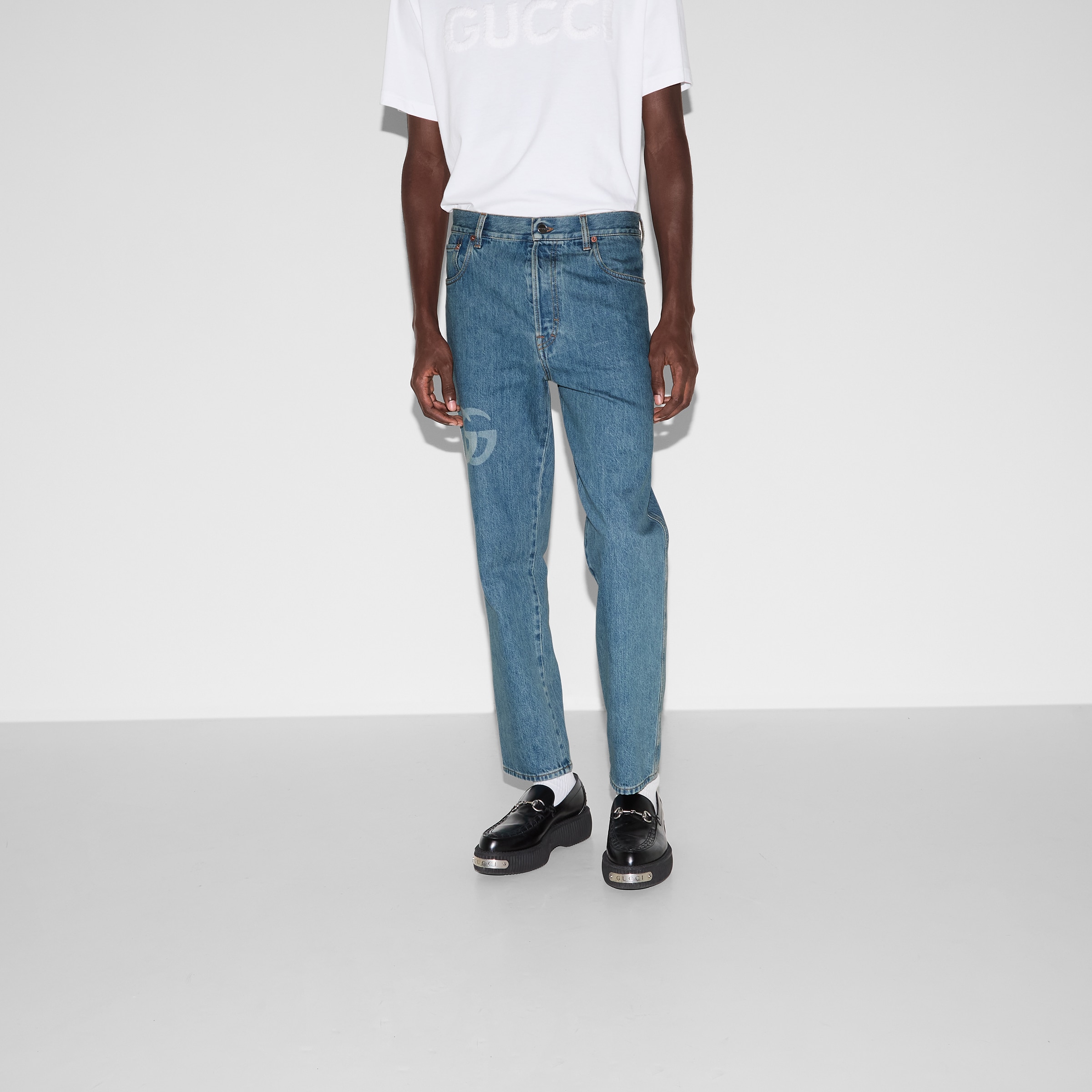 Pantalone in denim con Doppia G laserata in blu | GUCCI® Italia