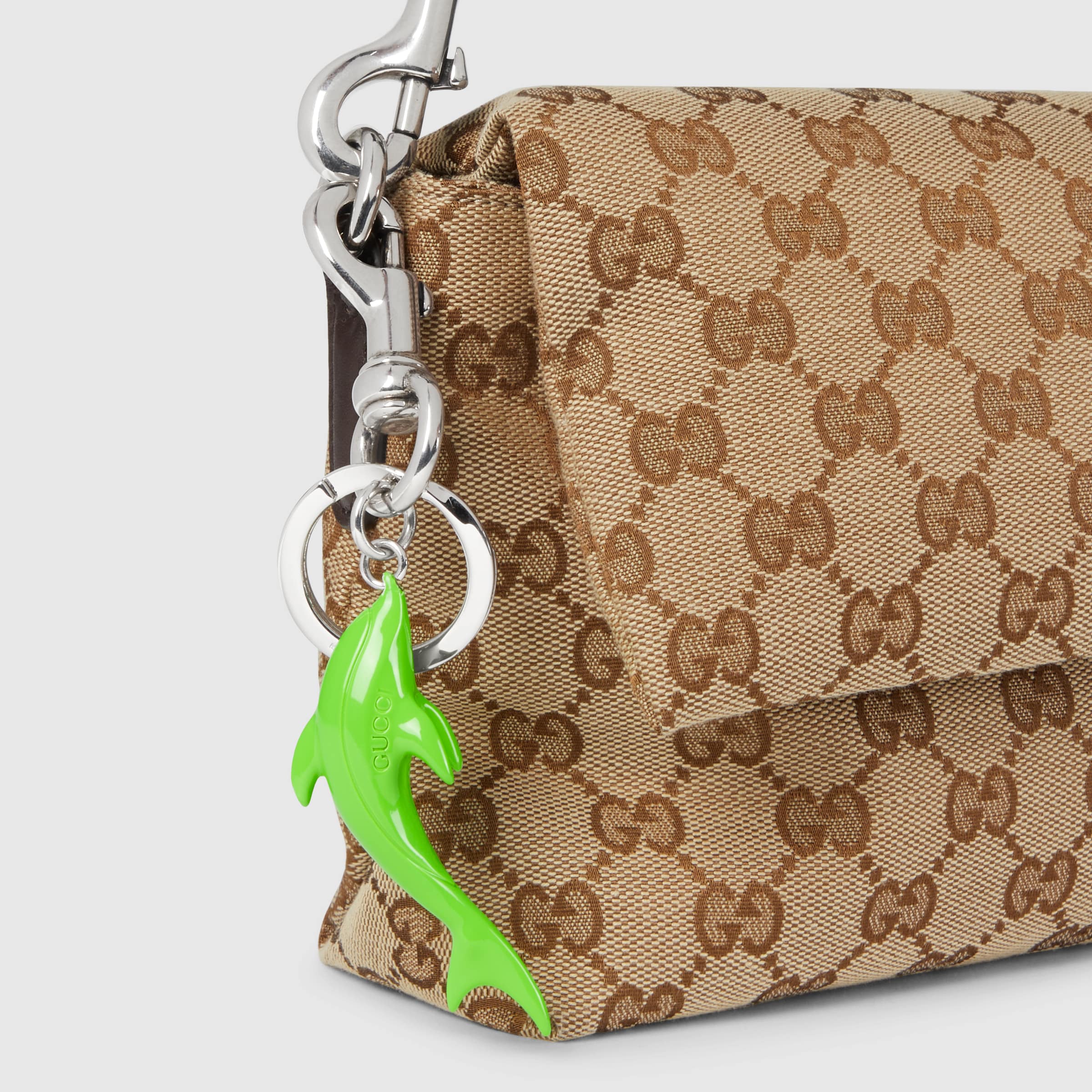 Engraved dolphin keychain charm in bright green metal | GUCCI® US