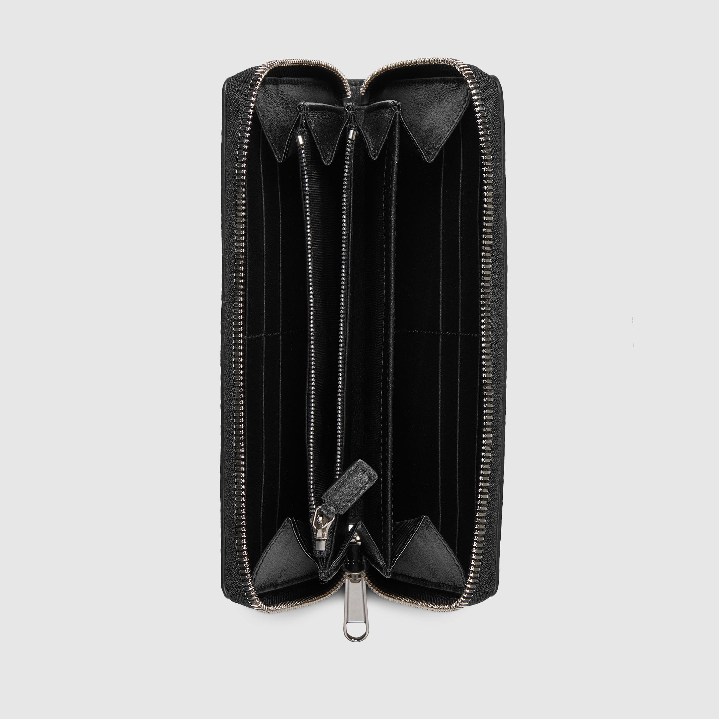 Gucci Imprint zip around wallet in black GG leather | GUCCI® SG