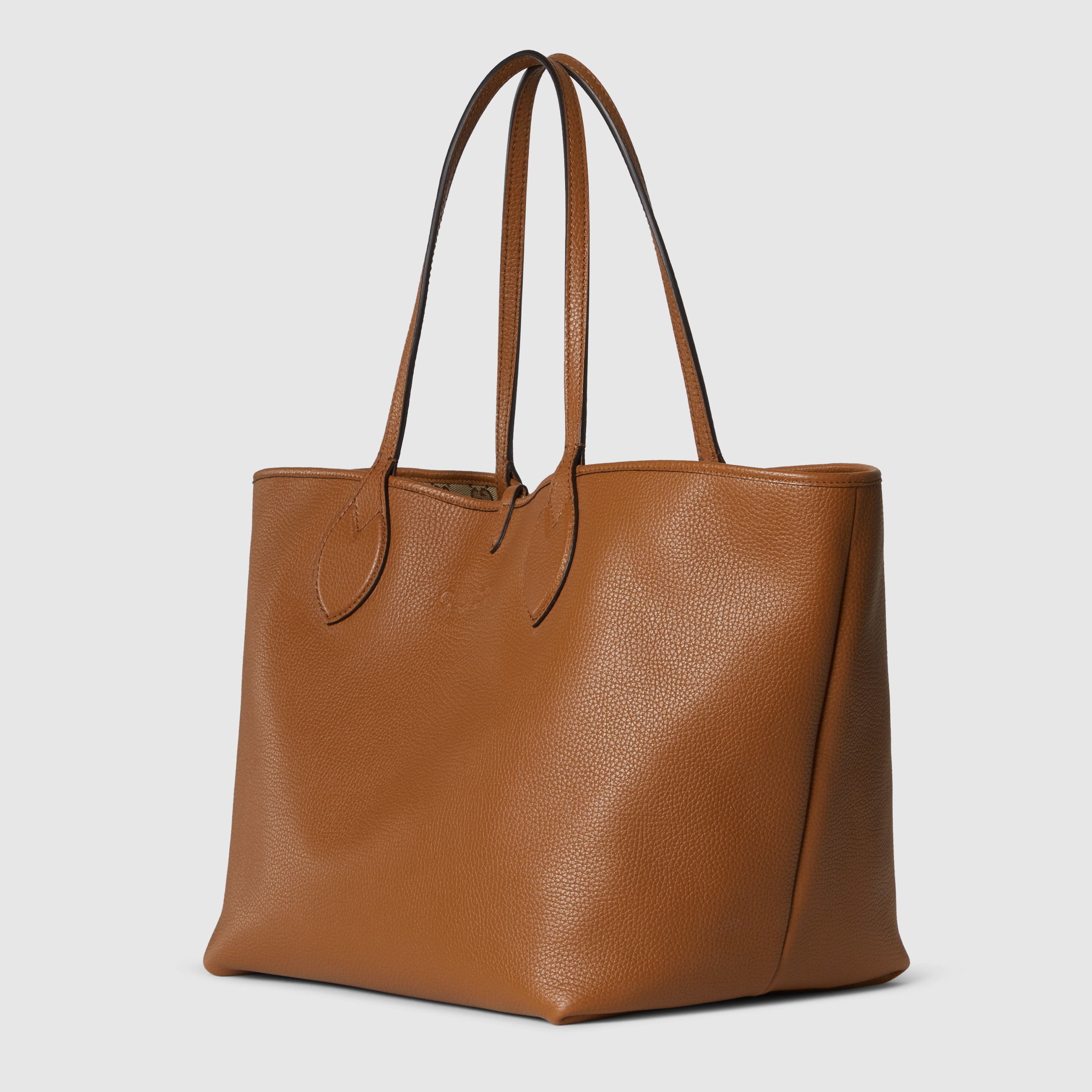 Gucci Totissima large reversible tote bag inbrown leather | GUCCI® International