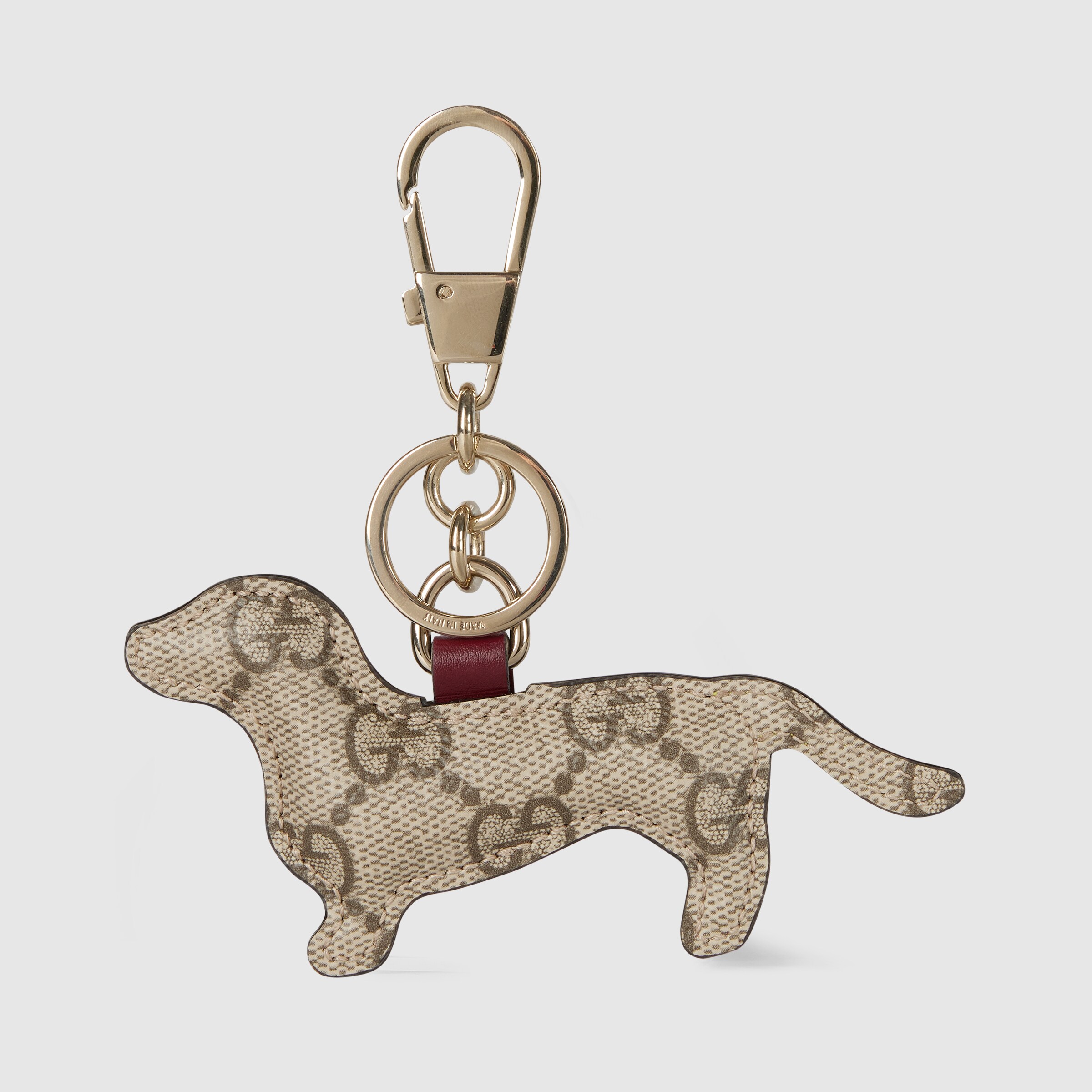 Dog-shaped bag charm in beige and brown GG fabric | GUCCI® Australia