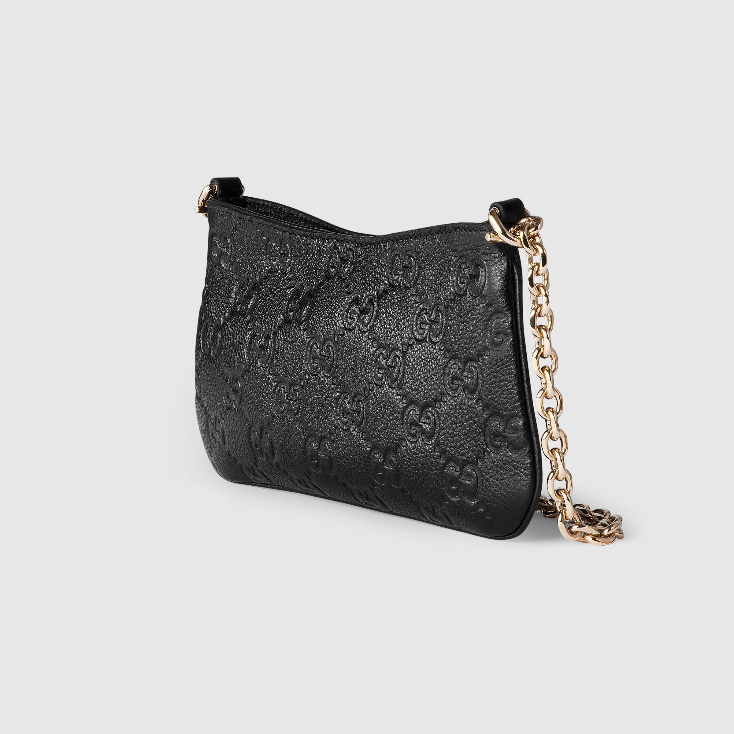 Borsa a spalla GG Emblem misura piccola in pelle nera | GUCCI® Italia