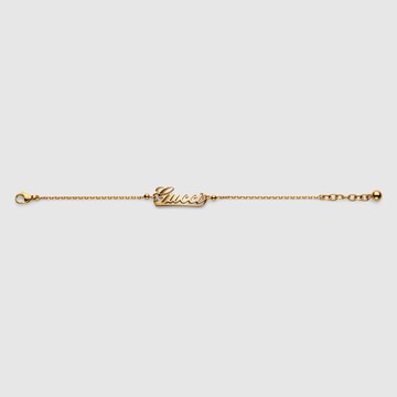 Chain bracelet with Gucci script in yellow gold-toned metal | GUCCI® US