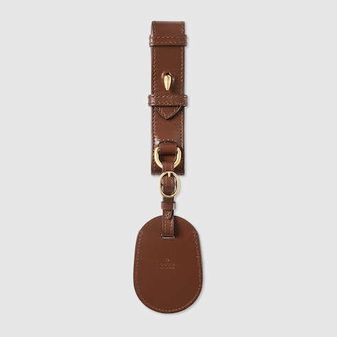 Oval identification travel tag in brown leather | GUCCI® GR