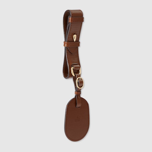 Oval identification travel tag in brown leather | GUCCI® GR