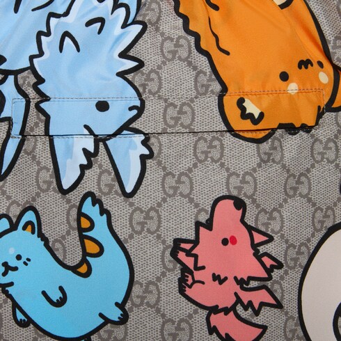 GG print nylon shorts in beige and ebony | GUCCI® GR