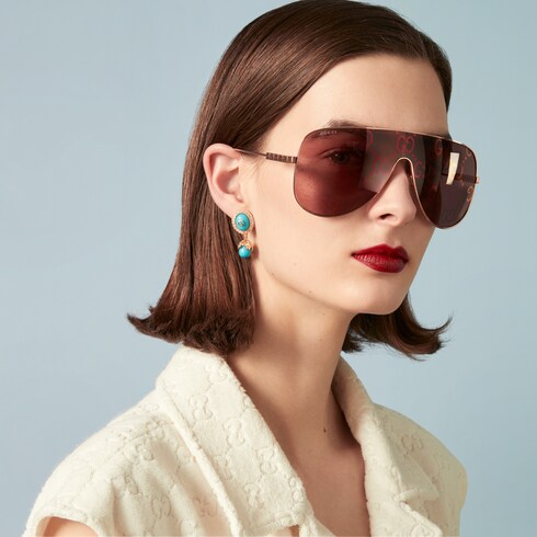 Interlocking G pearl earrings in Crystals Gold-toned metal | GUCCI® SI