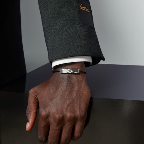Diagonal Interlocking G bracelet in black cotton | GUCCI® SG