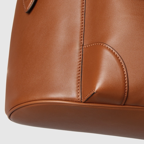 GG Emblem medium backpack in Brown Leather | GUCCI® SI