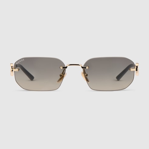 Gafas de sol con montura rectangular en metal dorado | GUCCI® ES