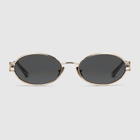 Gafas de sol con montura rectangular en tono dorado | GUCCI® ES