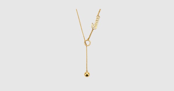 Drop chain necklace with Gucci script in yellow gold-toned metal ...
