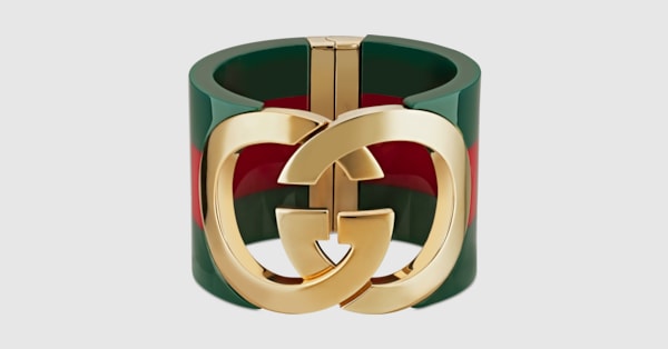 Bracciale rigido Gucci Interlocking in ottone color oro | GUCCI® IT