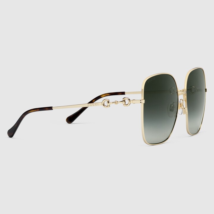 Square-frame sunglasses in gold metal and grey | GUCCI® US