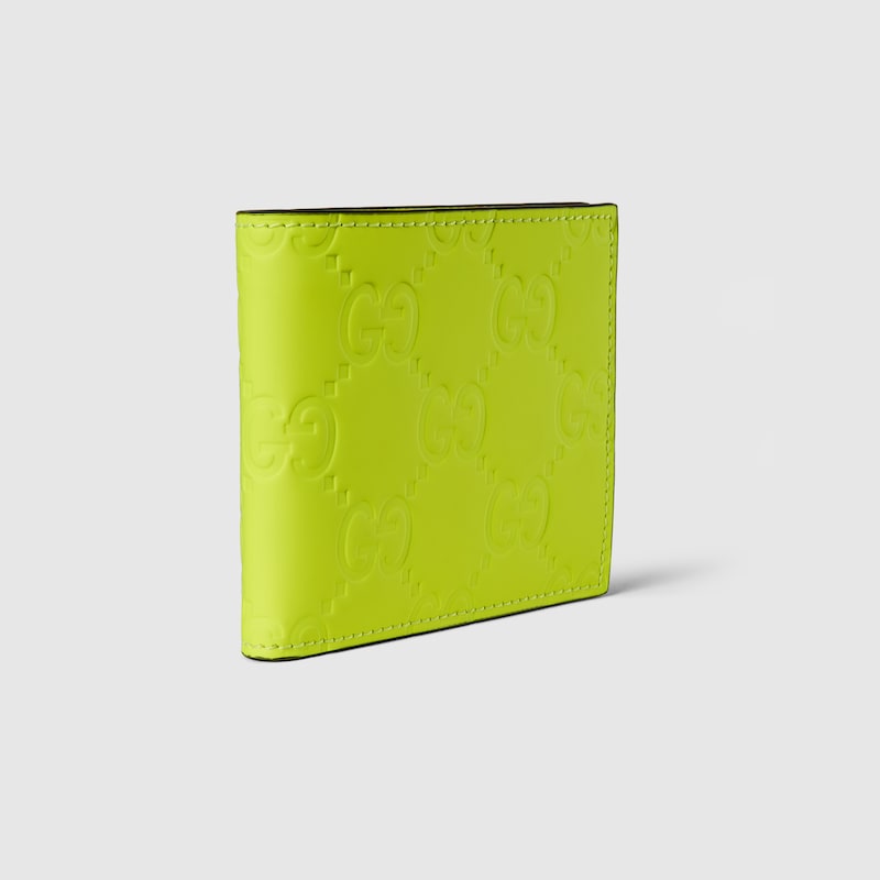 GG rubber-effect bi-fold wallet in fluorescent yellow leather | GUCCI ...