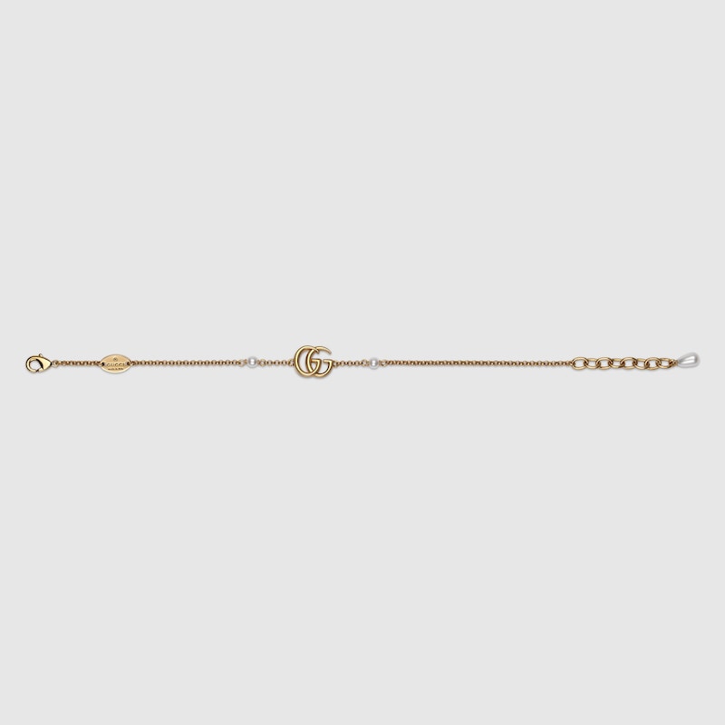GG Marmont chain bracelet with charm in yellow gold-toned metal | GUCCI ...