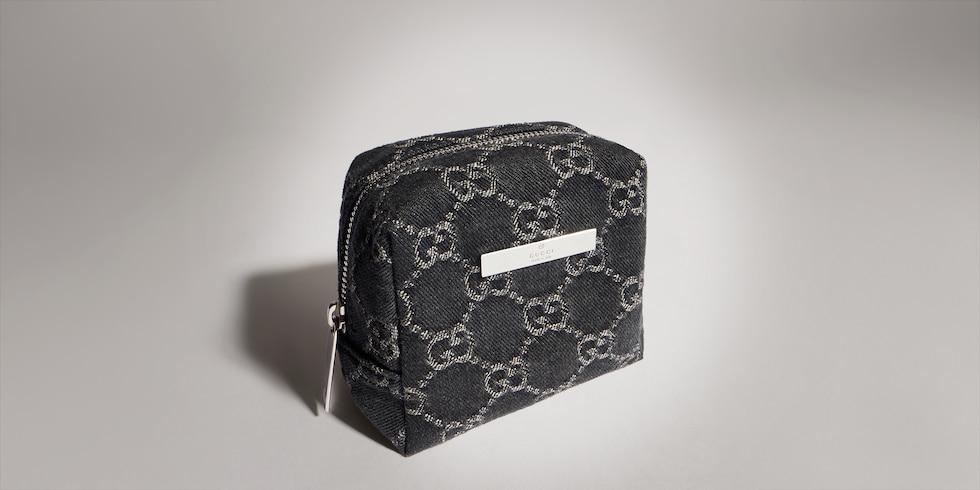 Small cosmetic case with Gucci plaque in black GG denim | GUCCI® SA