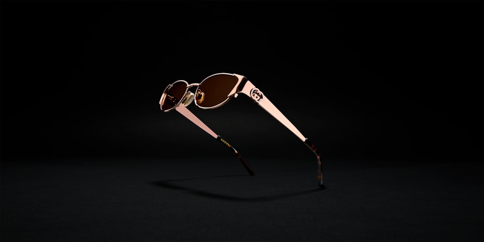 Oval-frame sunglasses in gold-toned | GUCCI® US