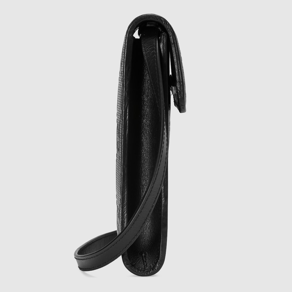 GG embossed mini bag in black leather | GUCCI® CZ