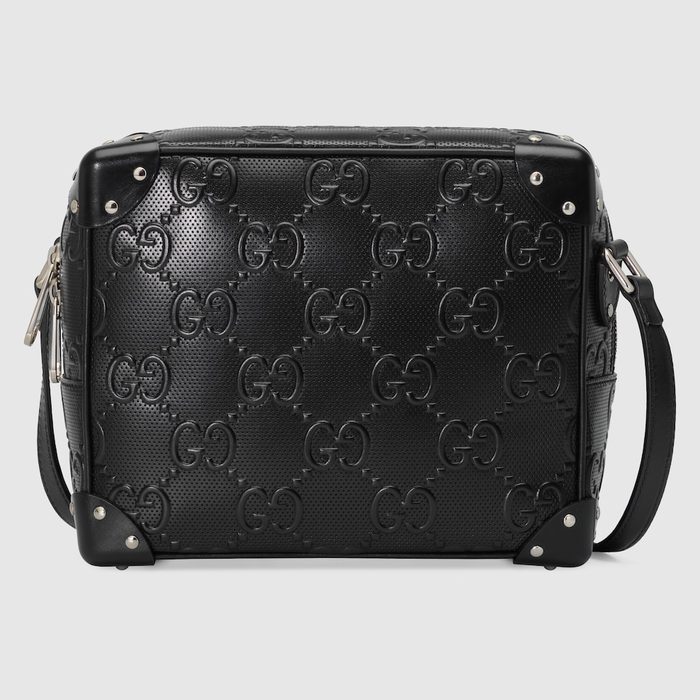 GG embossed shoulder bag in black leather | GUCCI® AE