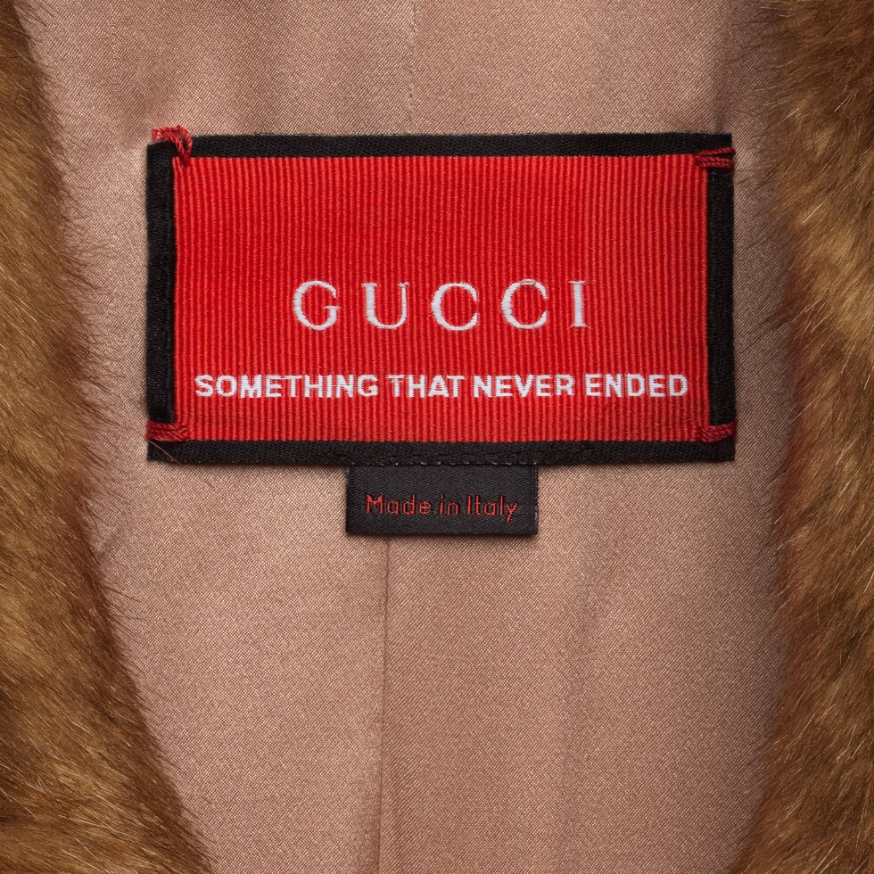 2015 Re-Edition faux fur coat in brown | GUCCI® AE