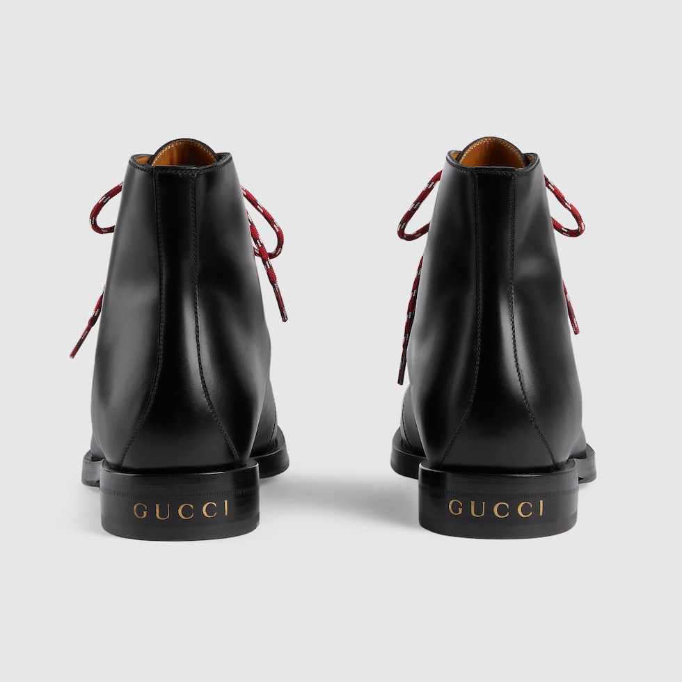 Men's lace-up ankle boots in black leather | GUCCI® DK