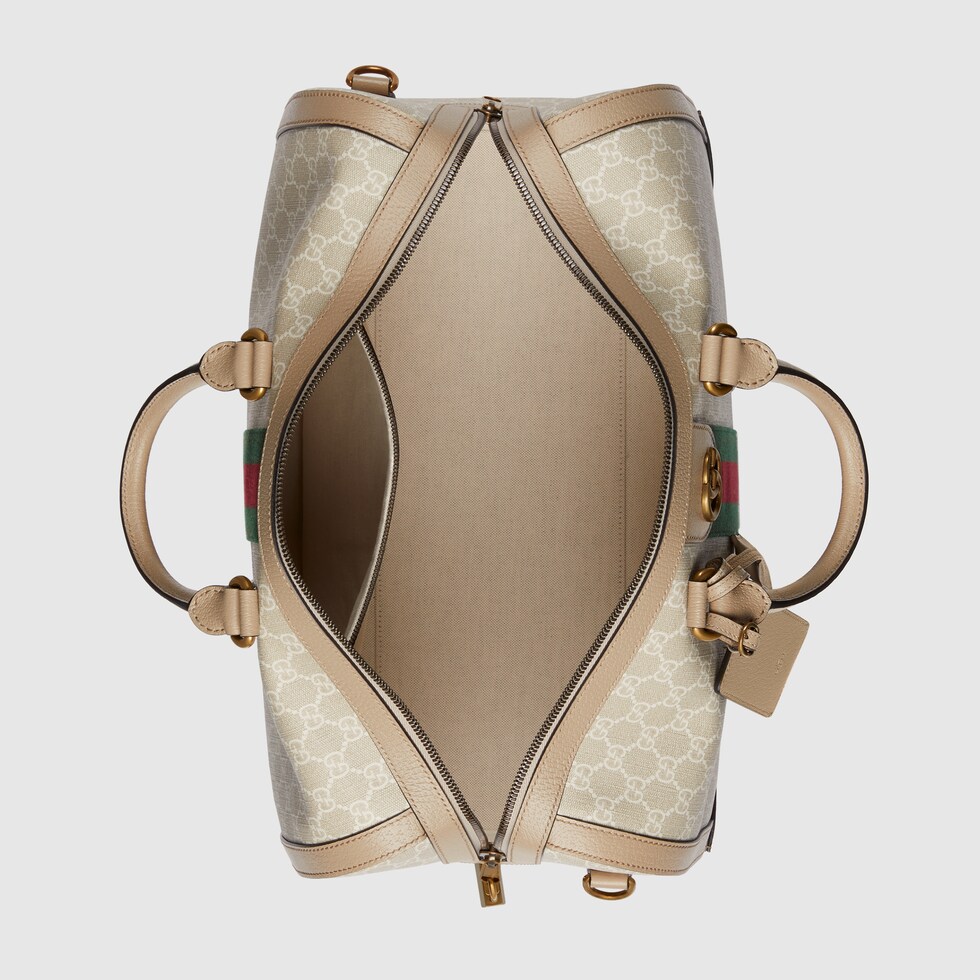 Gucci Savoy small duffle bag in beige and white GG Supreme | GUCCI® GR