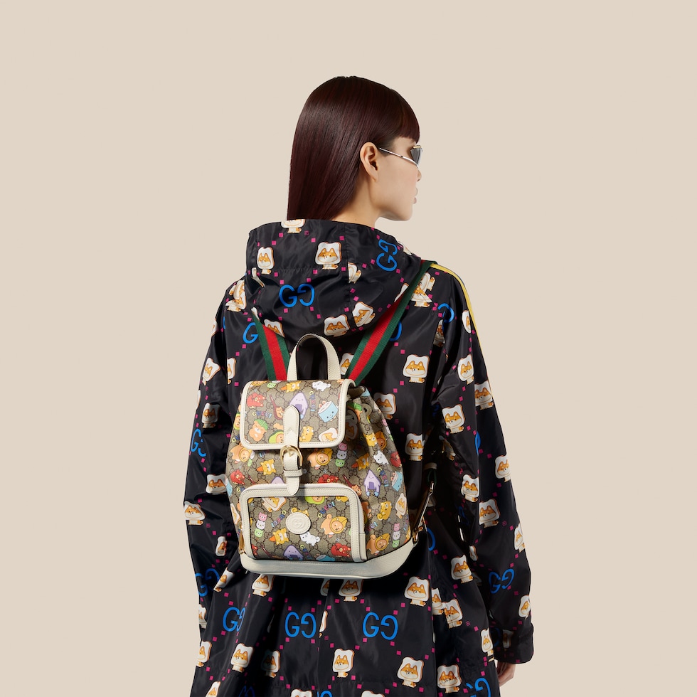 米色及烏木色SupremeGucci動物印花背包 | GUCCI® 香港