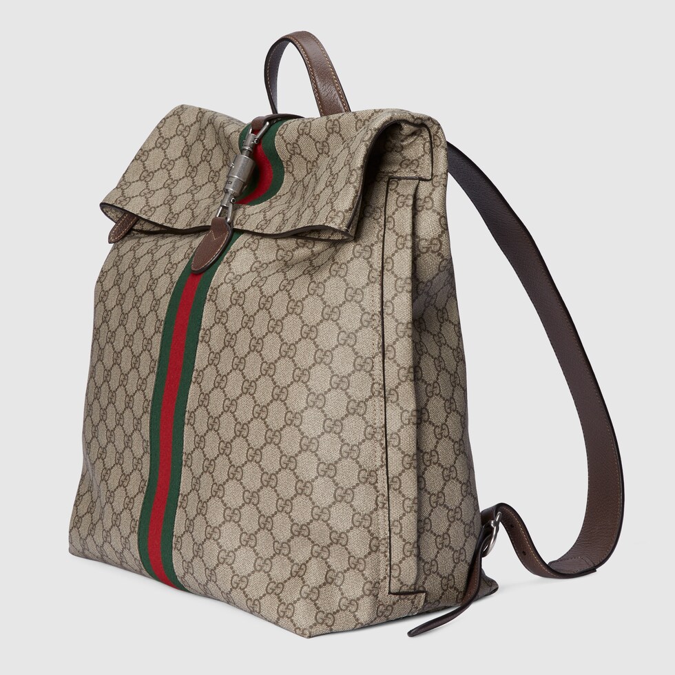 GG backpack with piston closure in beige and ebony GG Supreme | GUCCI® AE