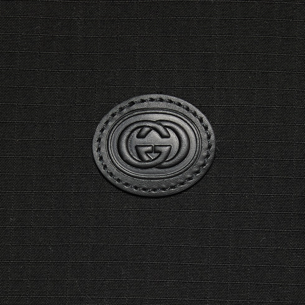 Reversible GG ripstop nylon jacket in black and grey | GUCCI® US