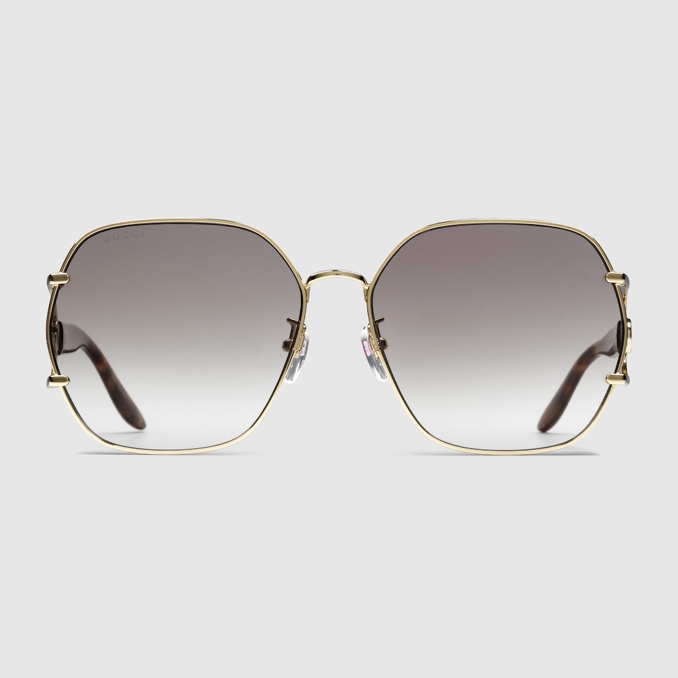 Geometric frame sunglasses in yellow gold-toned metal | GUCCI® SG