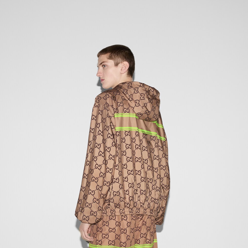 Light nylon GG print hooded jacket in beige and ebony | GUCCI® PL