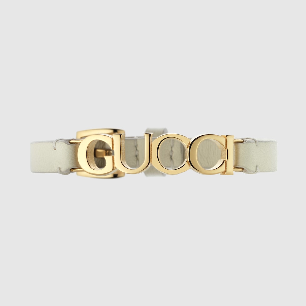 Leather bracelet with Gucci script in ivory leather | GUCCI® UK