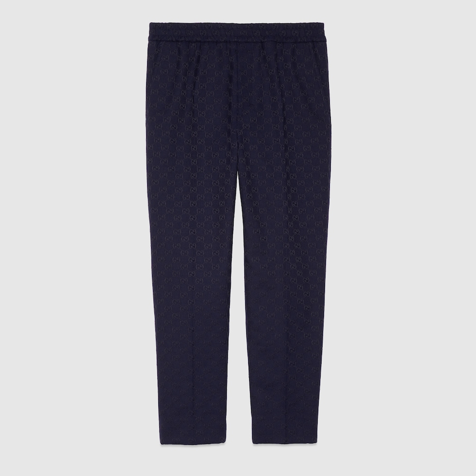 GG canvas track bottoms in dark blue | GUCCI® SG