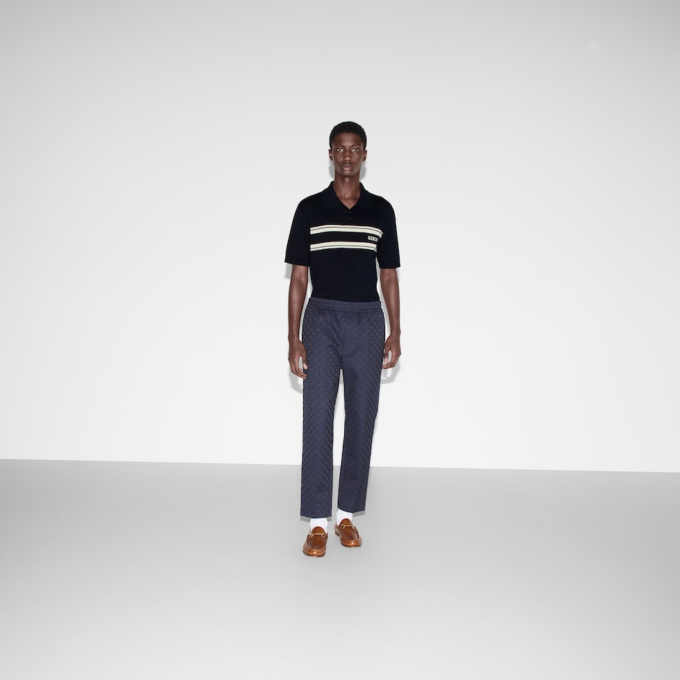 GG canvas track bottoms in dark blue | GUCCI® CH